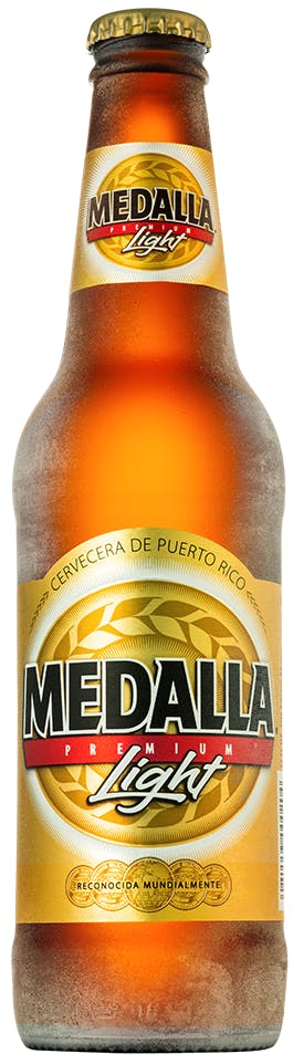 Medalla Light Premium Light 6 pack 12 oz. Bottle - Yankee Spirits